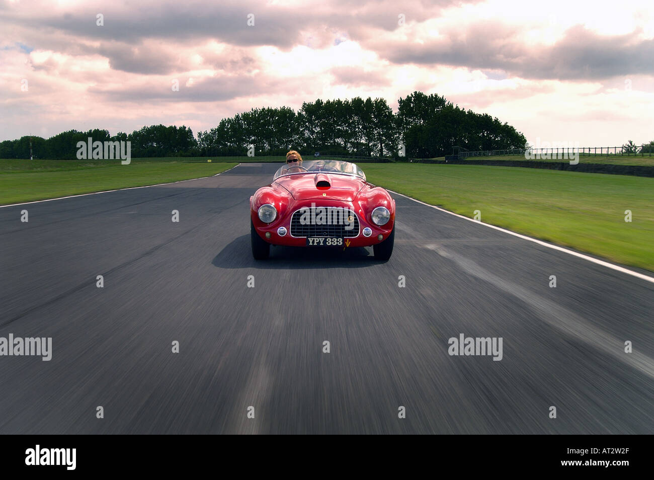 Sally Mason Styrron driving her 1950 Ferrari 166 Barchetta around the ...