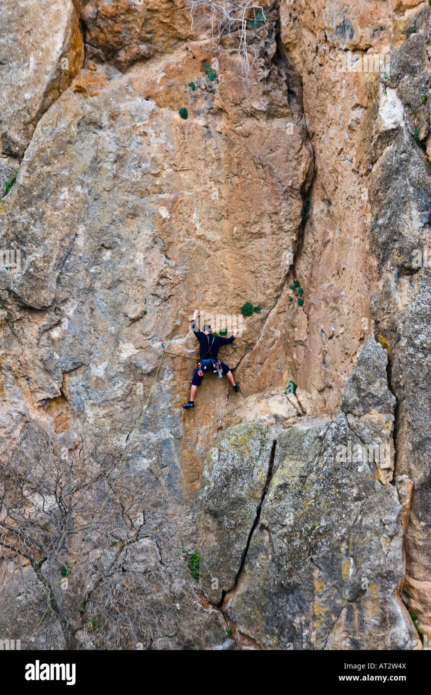 Rock climber at ladder Stock Photo - Alamy