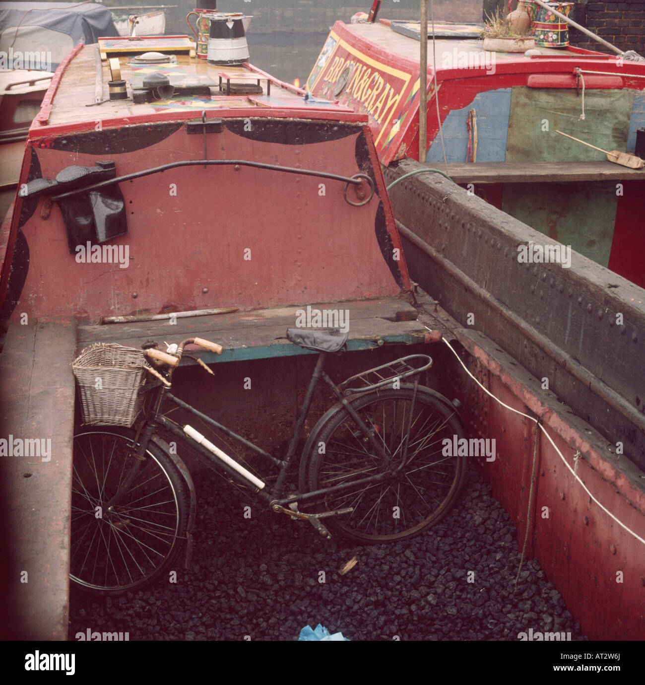 Bicycle and coal in hold of traditional narrow boat Stock Photo - Alamy
