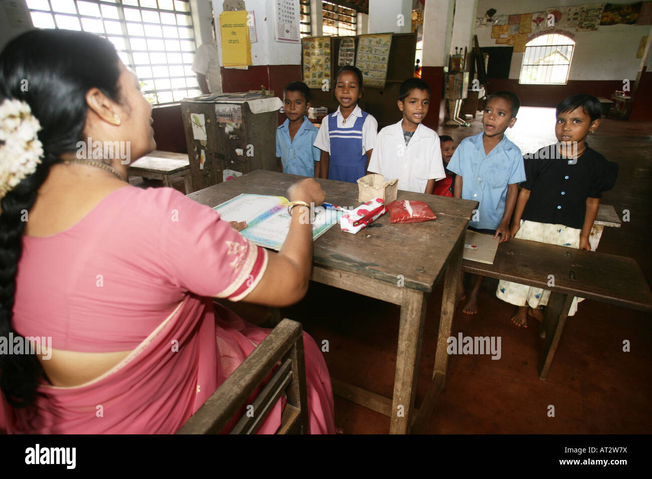 A teacher taking class at a school in Bangalore india Stock Photo - Alamy