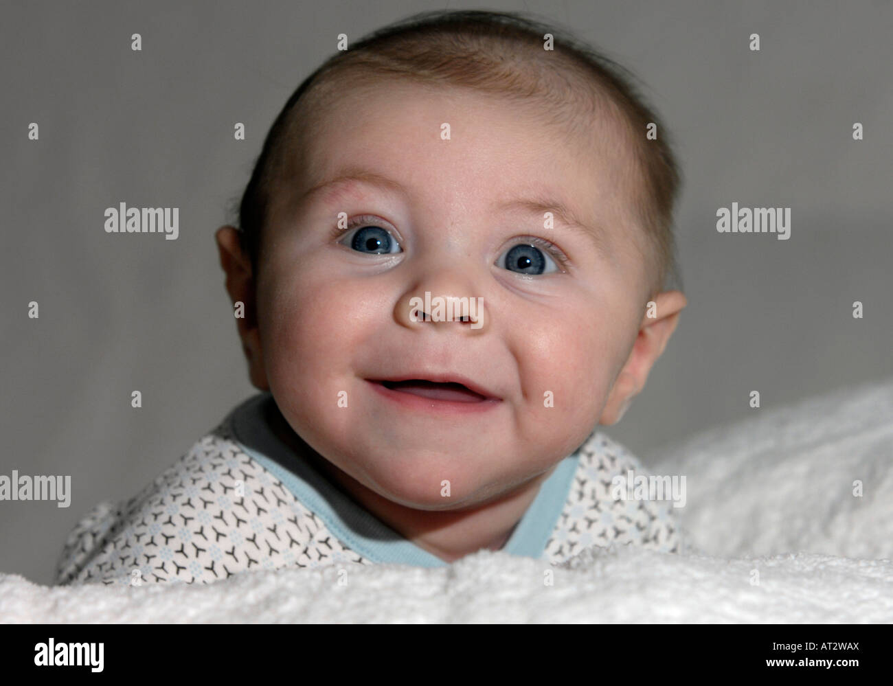 3 month old caucasian baby boy with blue eyes smiling Stock Photo - Alamy