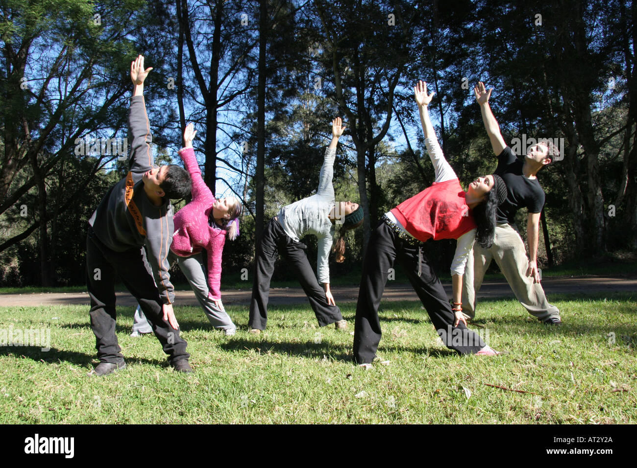 People practising Yoga in Australian Bush Nature New Age excercise ...