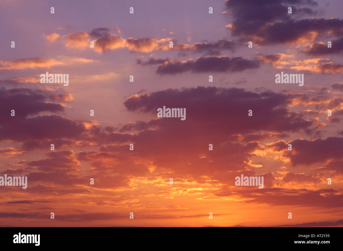 Orange Cloudy Sky At Sunset Sunrise Background Layer Stock Photo - Alamy