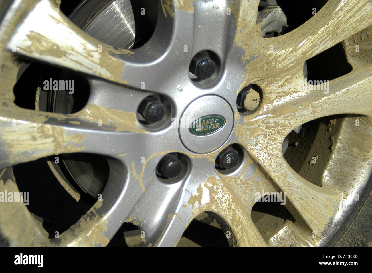 Mud splattered Land Rover wheel Stock Photo - Alamy