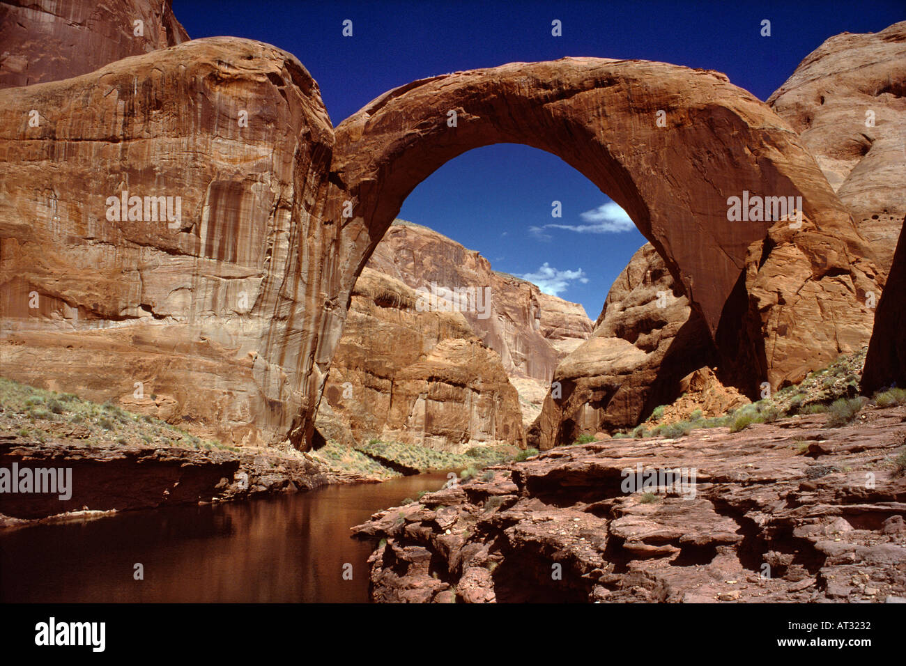 Rainbow Bridge 309 feet high on the edge of Lake Powell Utah USA Stock ...