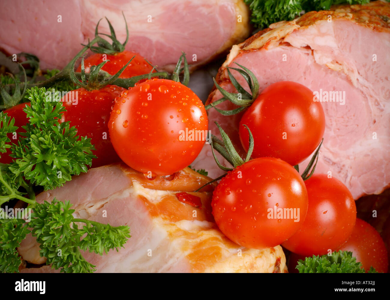 Joints of ham with a vegetables Stock Photo - Alamy