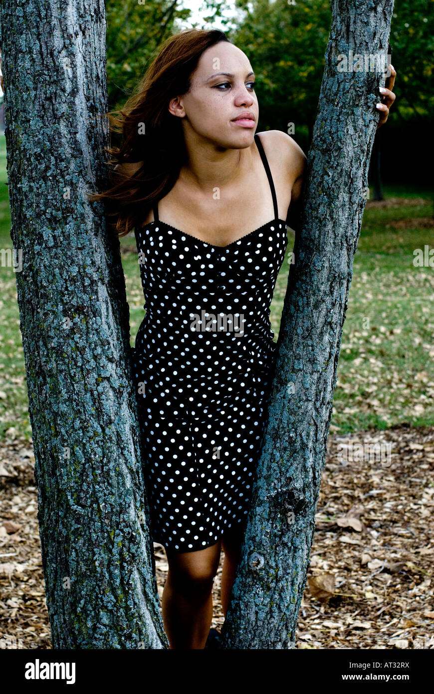 Fashion model with attitude posing outside Stock Photo - Alamy