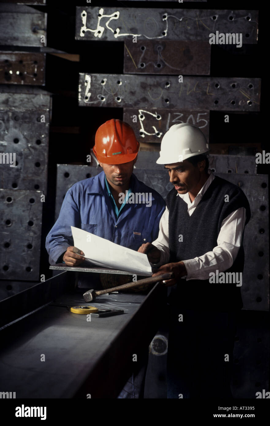Steel workers in Riyadh Saudi Arabia steel plant Stock Photo - Alamy