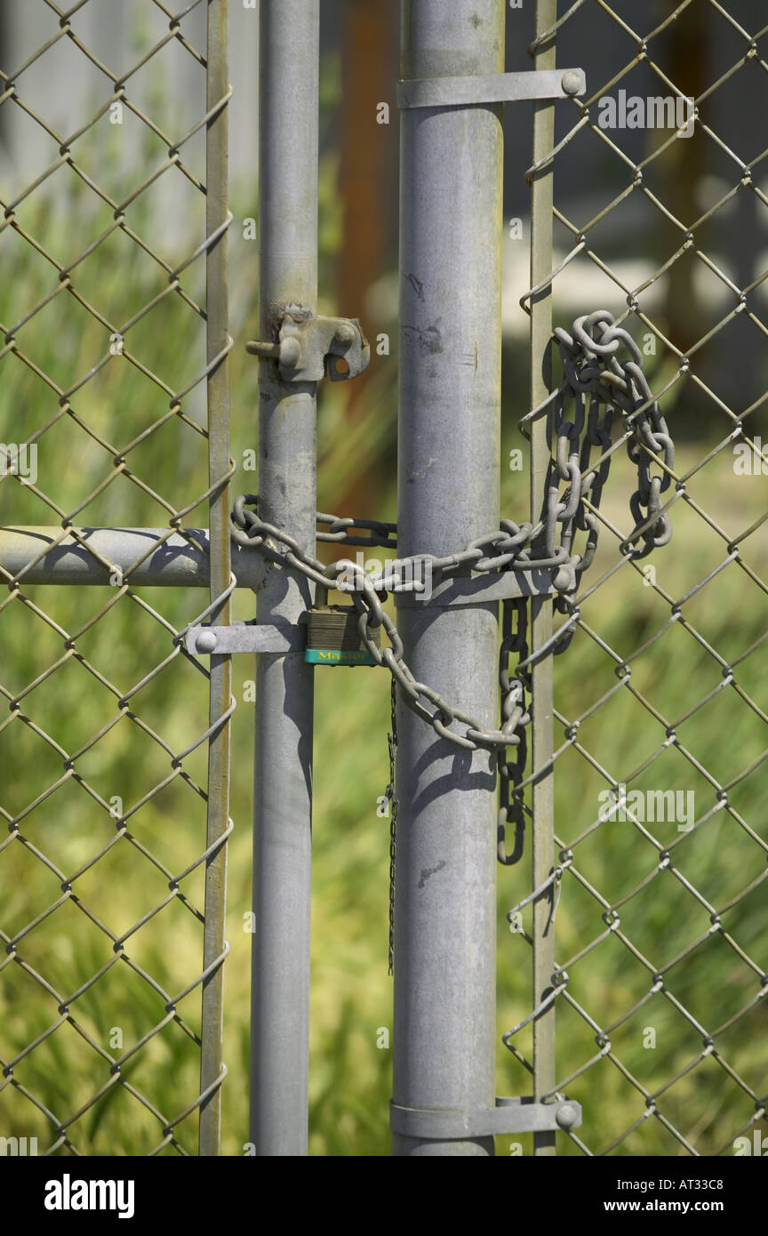 Chain link fence security barricade padlock hi-res stock photography ...