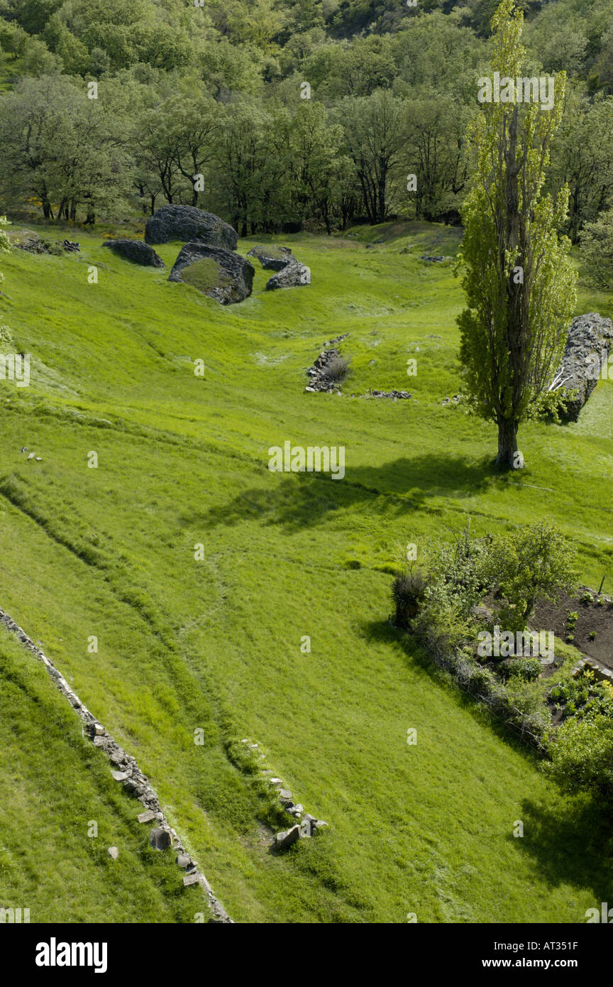 France Ardeche Mirabel Village Above A Grass Field And A Forest At ...