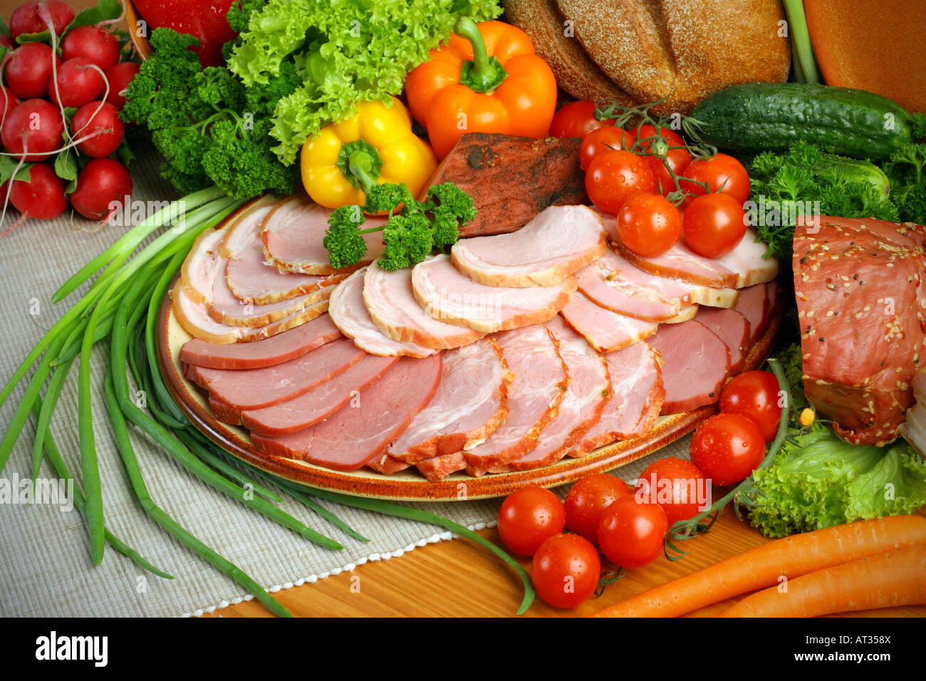 Ham cold meats platter with assorted vegetables Stock Photo - Alamy