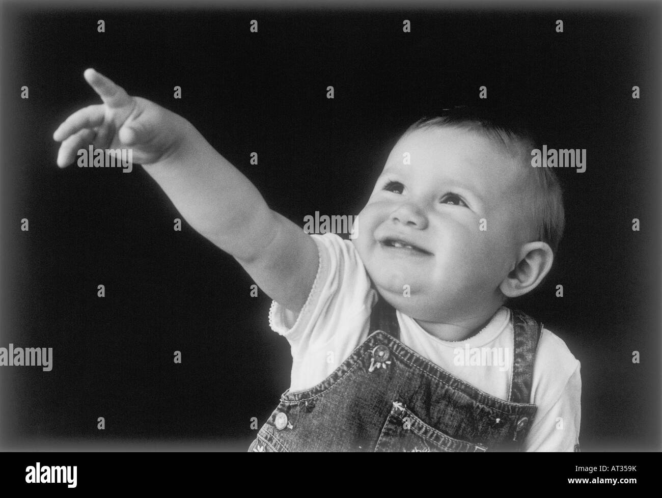 A toddler pointing its finger Stock Photo - Alamy
