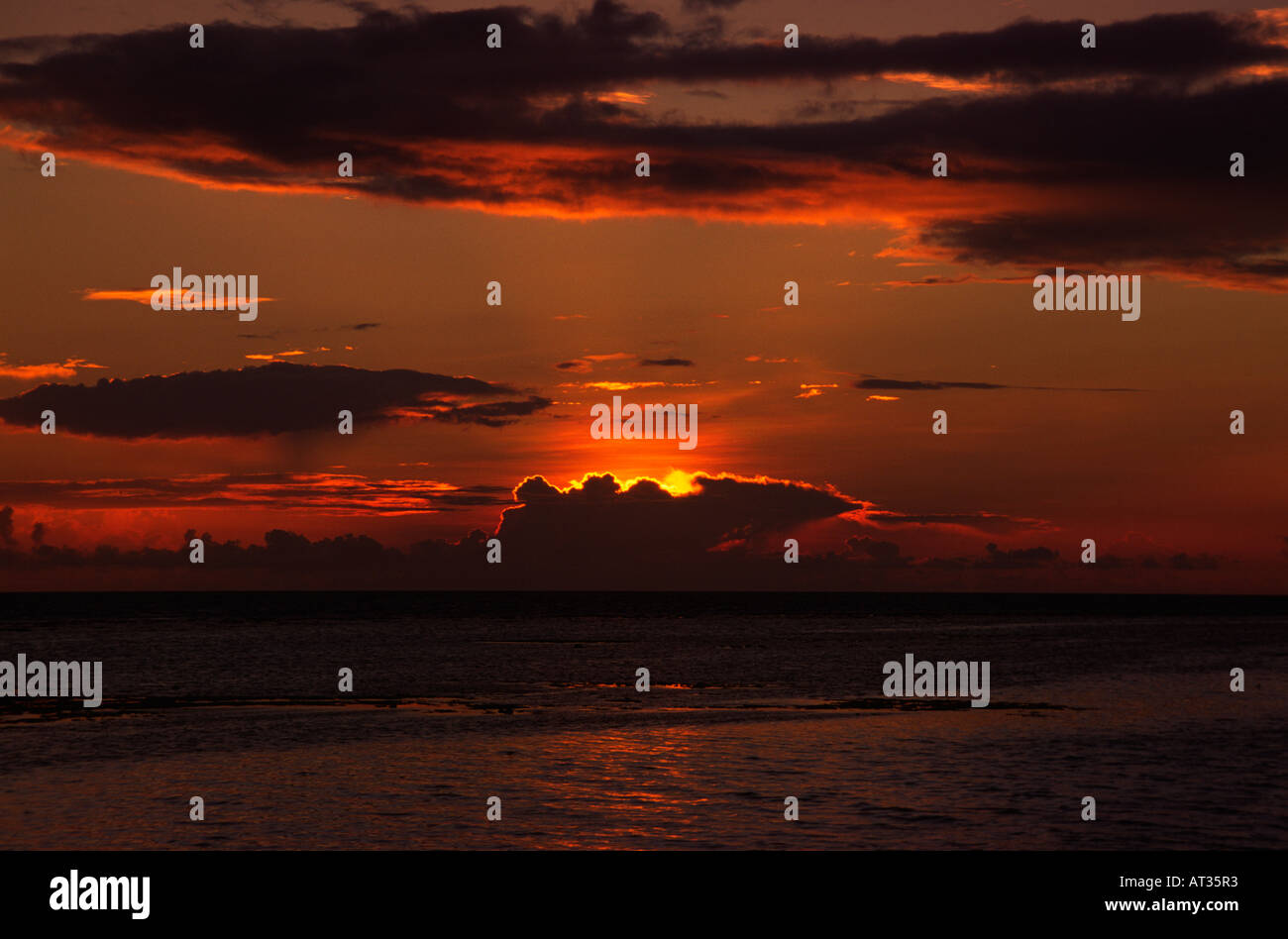 Sunset in the tropics Stock Photo - Alamy