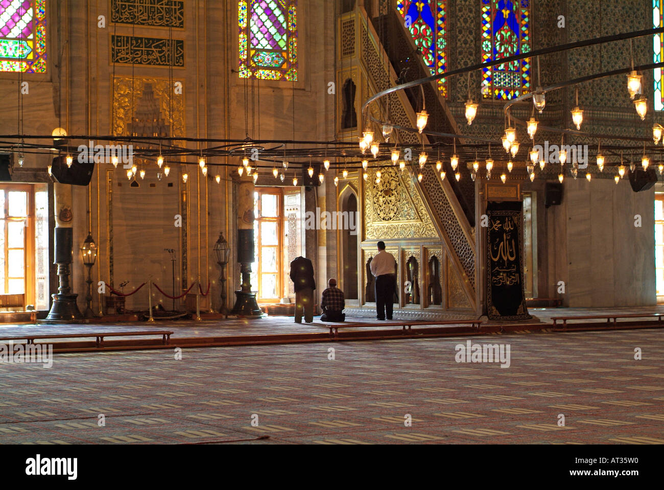 Men praying in the Blue Mosque in Istanbul, Turkey Stock Photo - Alamy