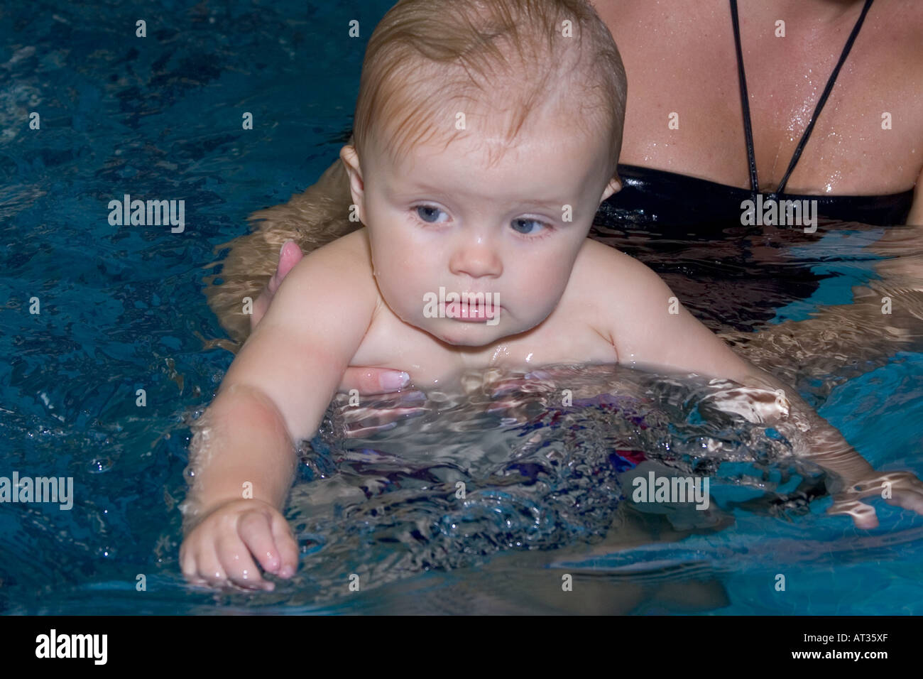 baby in swimming pool Stock Photo - Alamy