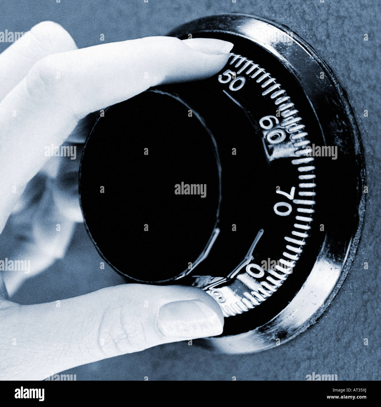 Opening a safe Stock Photo - Alamy