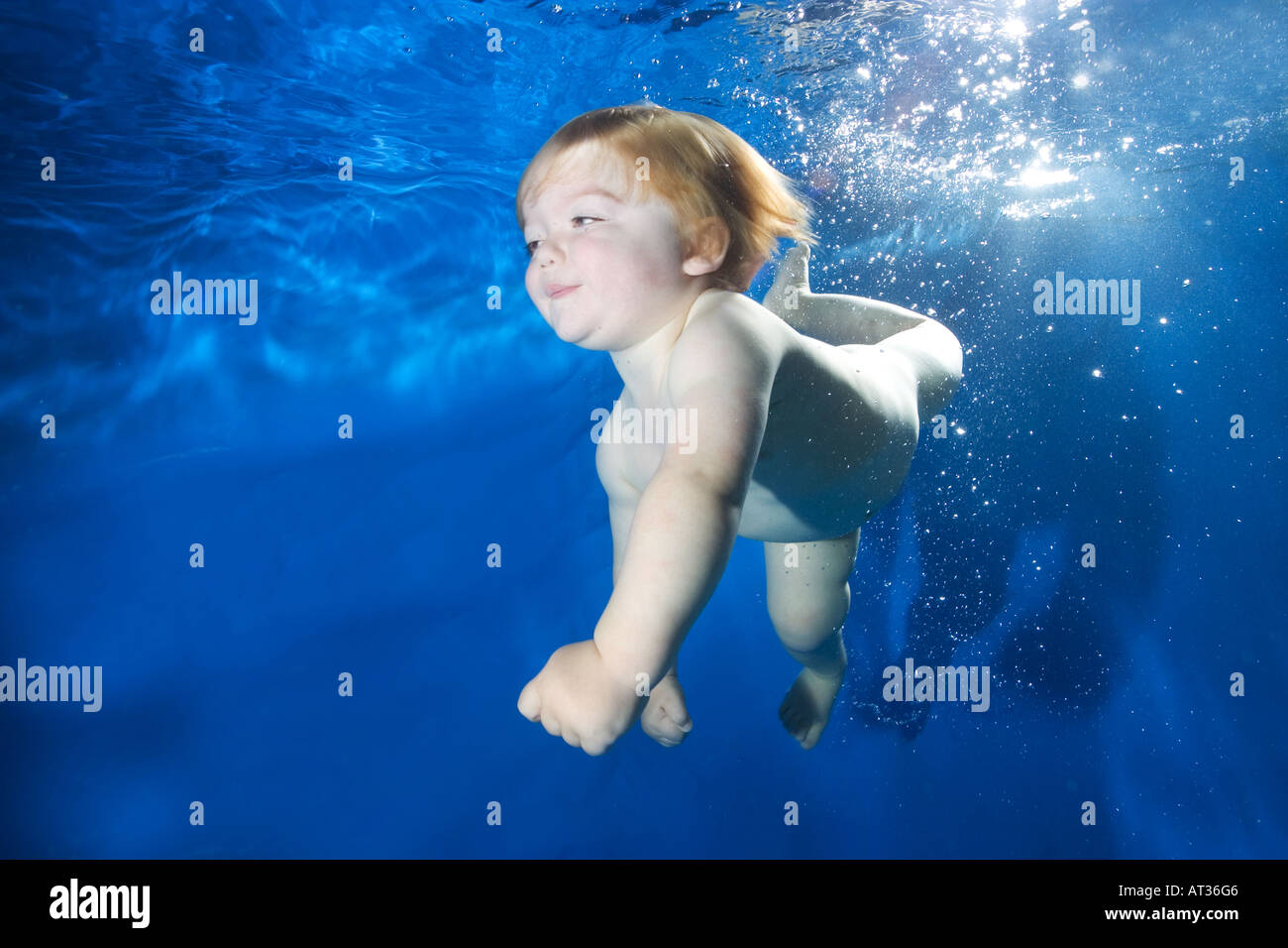 Swimming underwater baby pool young hi-res stock photography and images ...