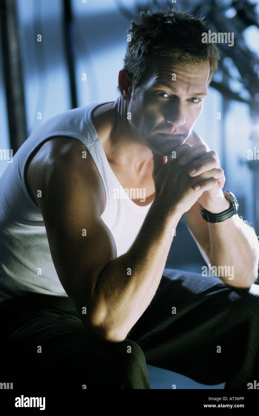 A man sitting, facing camera Stock Photo - Alamy