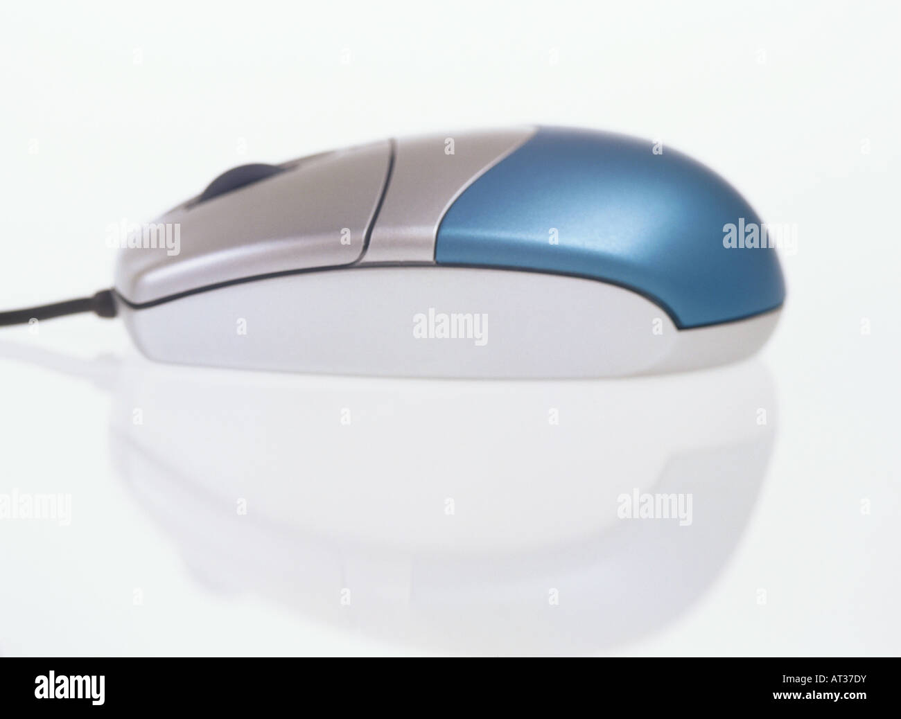 A blue and silver computer mouse Stock Photo - Alamy