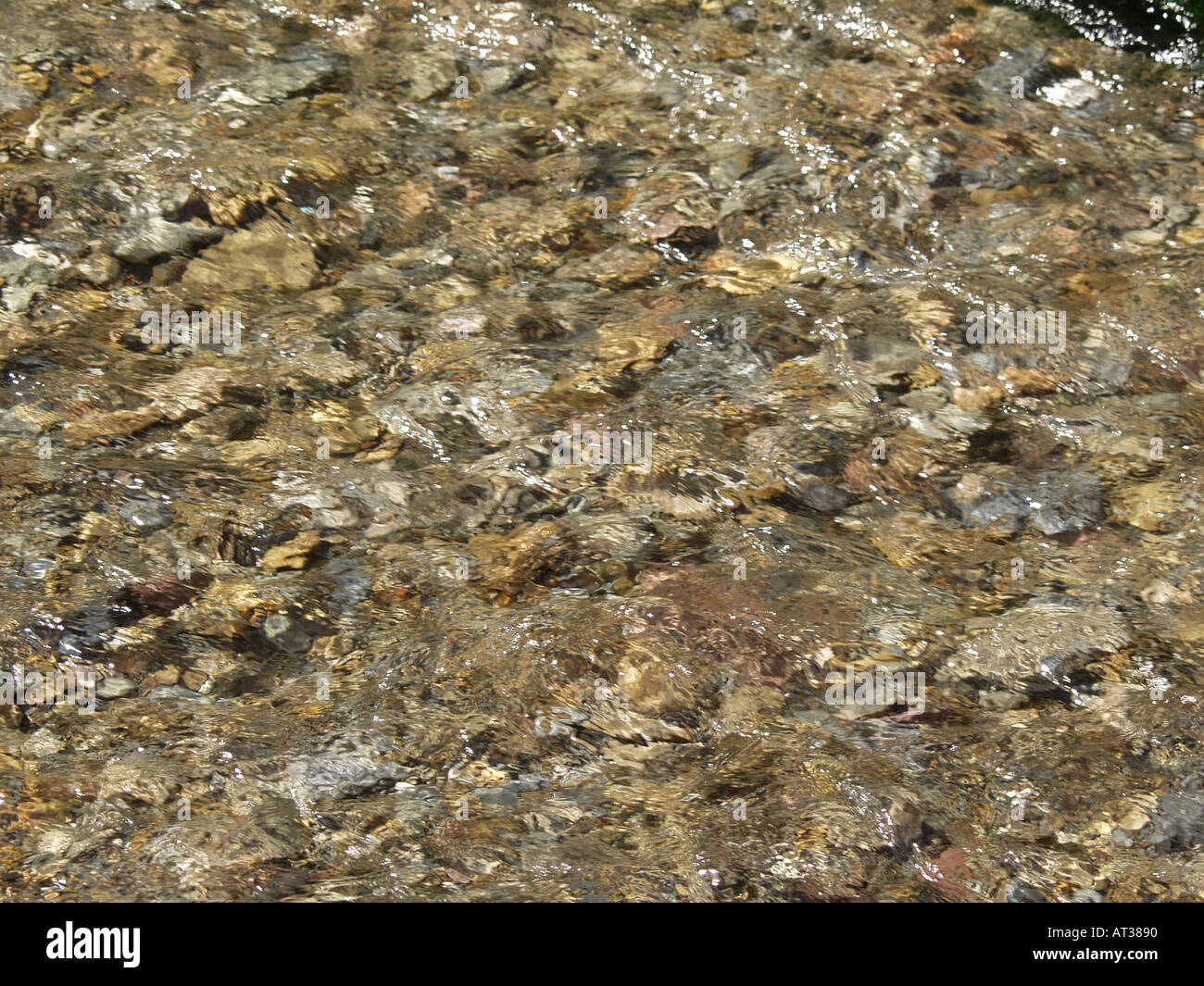 Watery Pebbles Stock Photo - Alamy