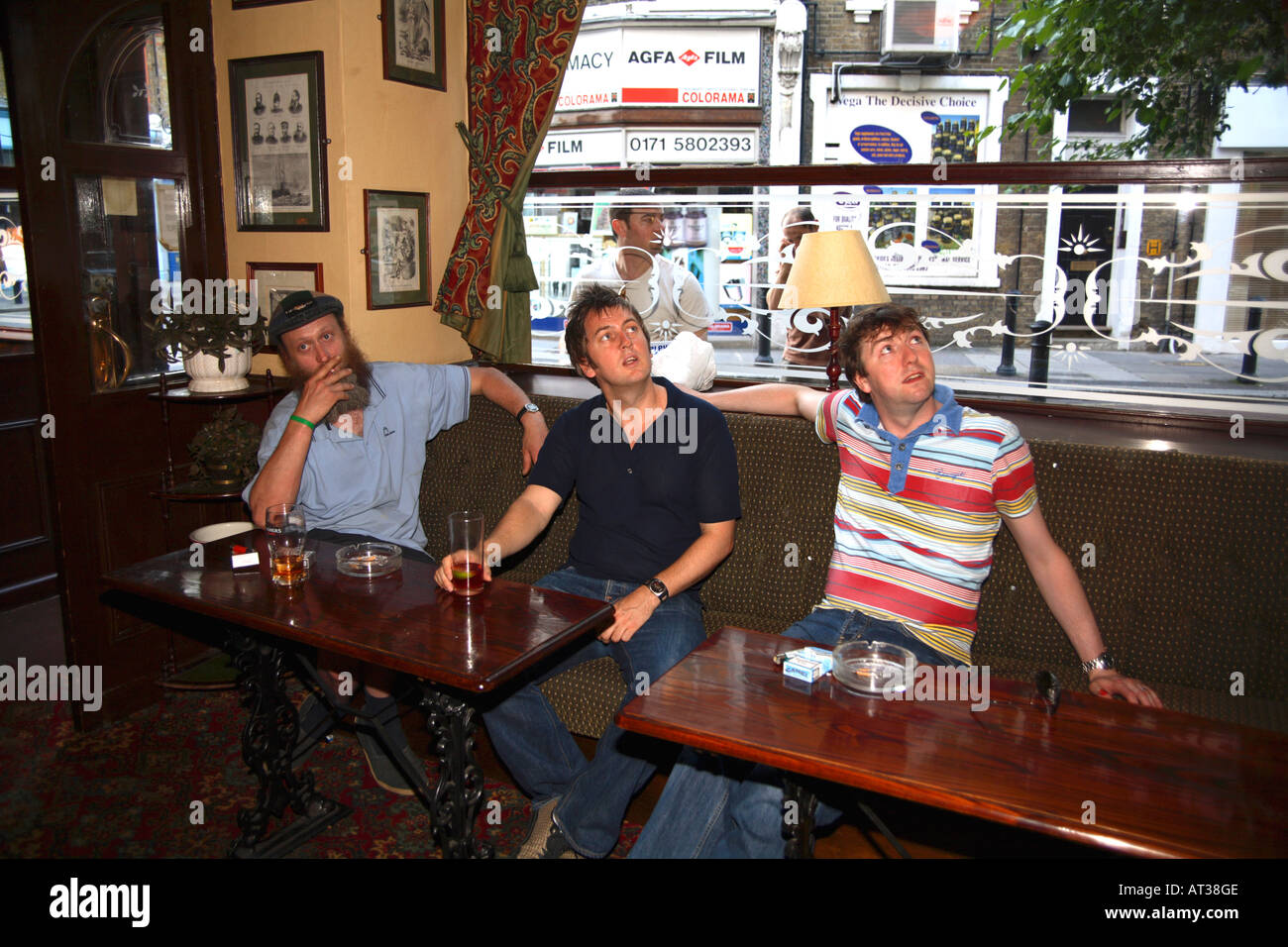Three guys in pub watching Argentina vs Ivory Coast in the Kings Arms ...