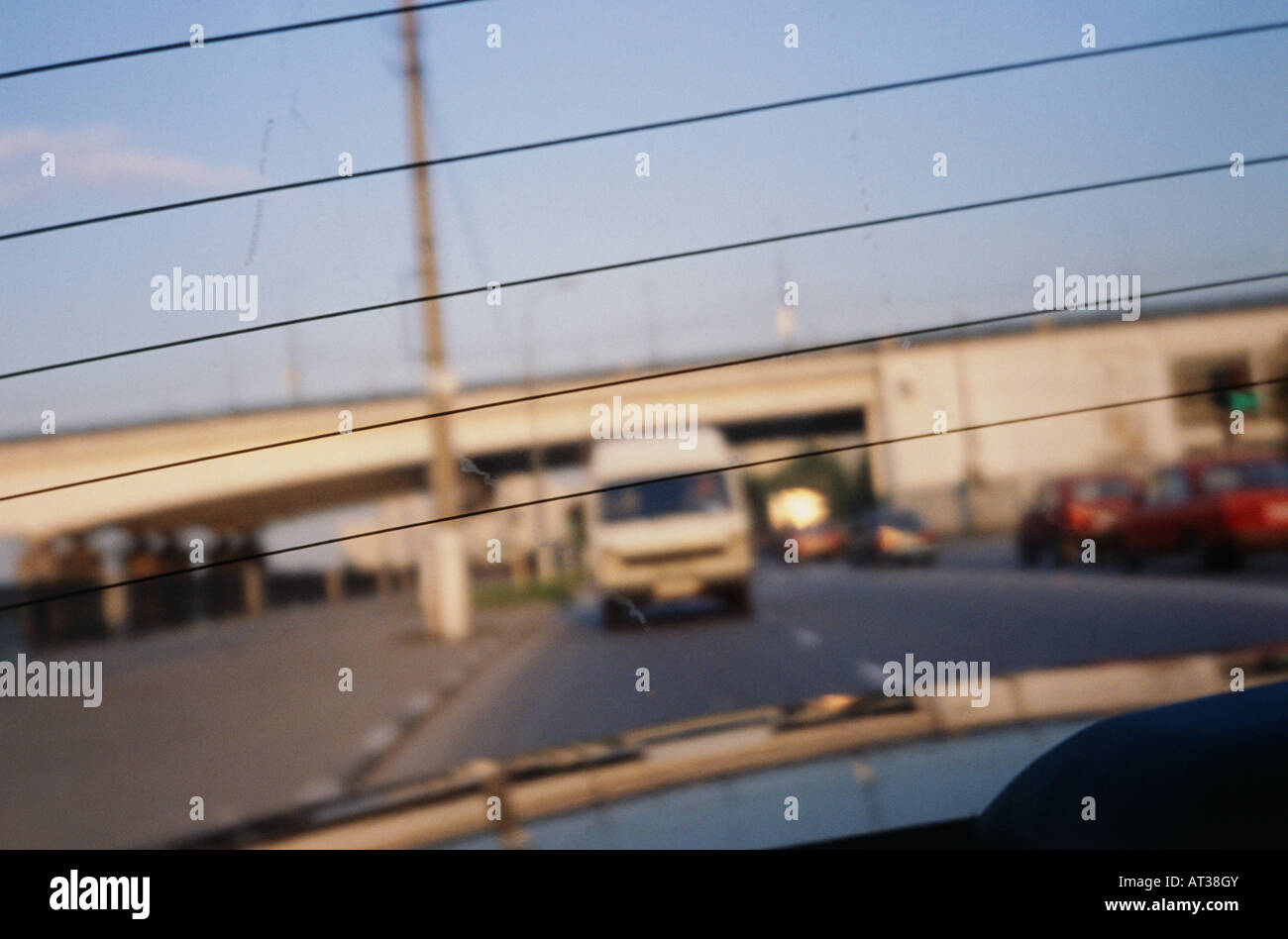 A white van seen through the rear window of a car Stock Photo - Alamy