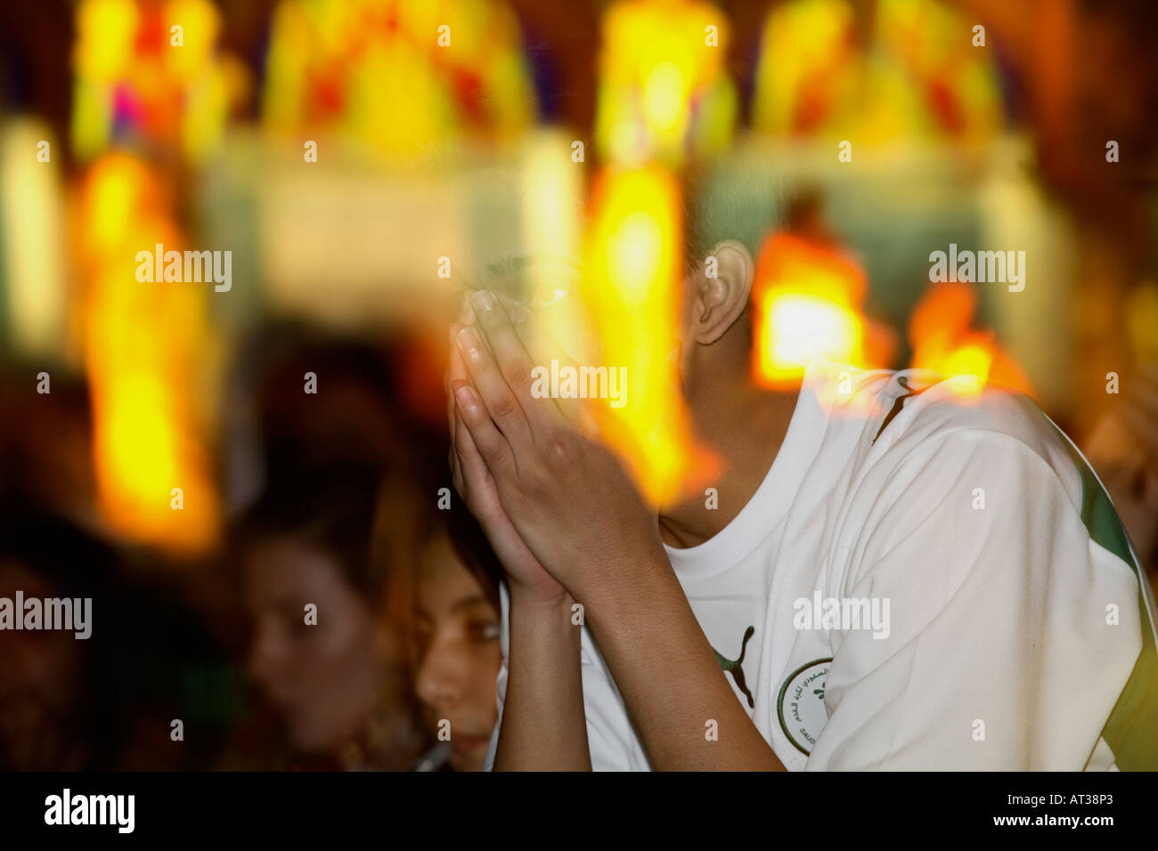 Saudi Arabia fan praying for time whilst watching their game vs Tunisia ...