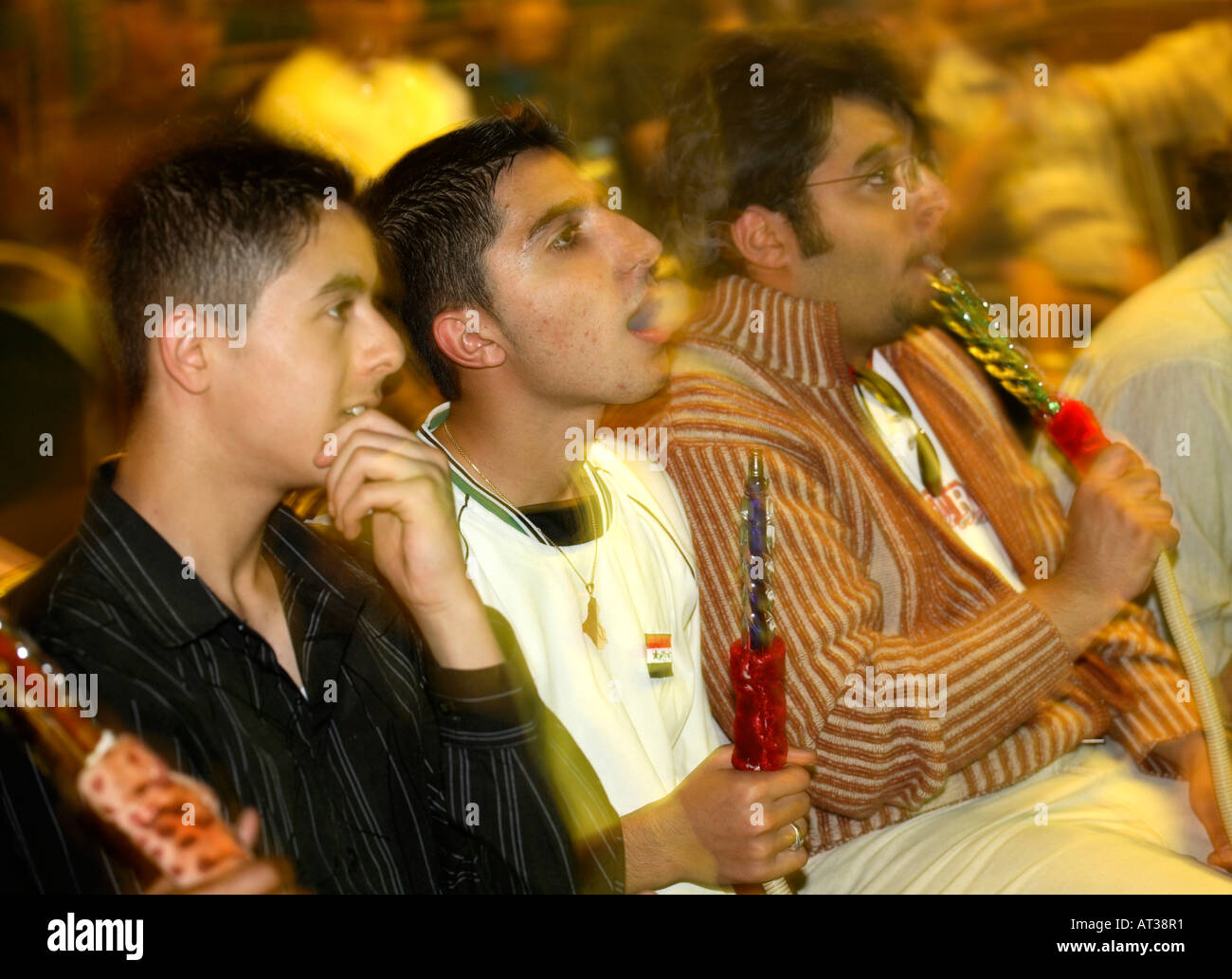 Saudi Arabian fans smoke shisha pipes watching their game vs Tunisia ...