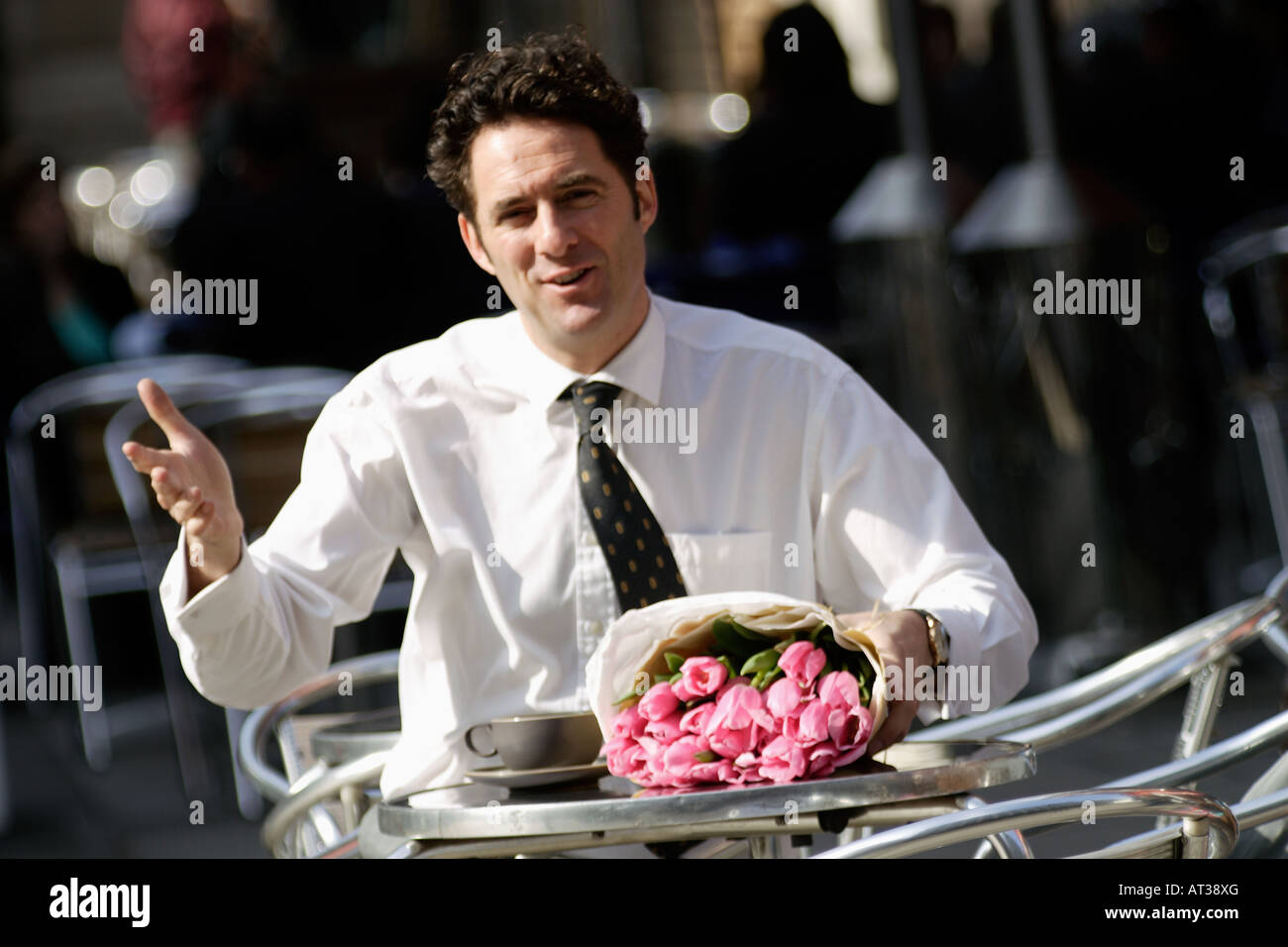 A man acknowledging his friend Stock Photo - Alamy