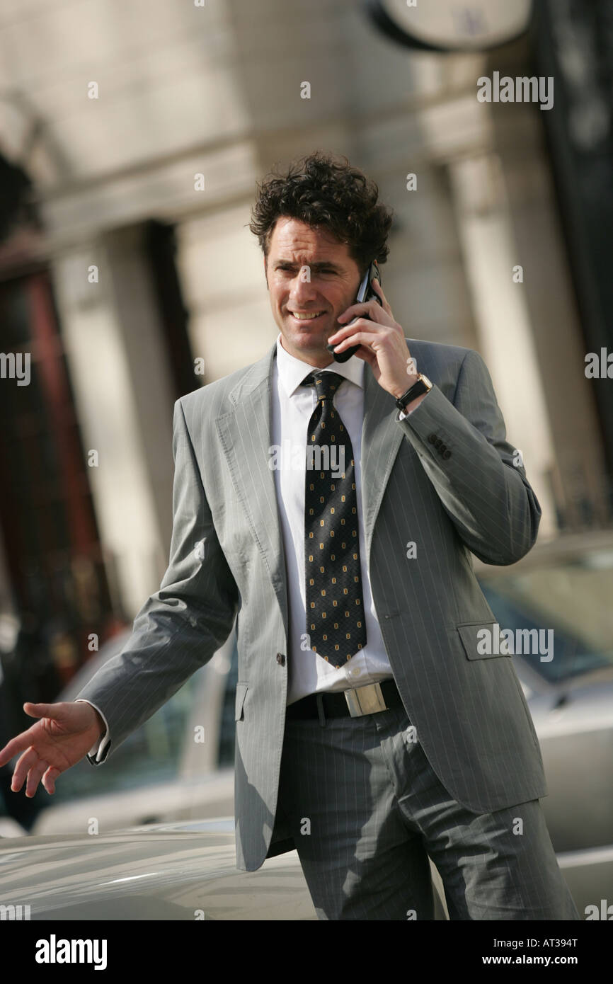A man speaking on a mobile Stock Photo - Alamy