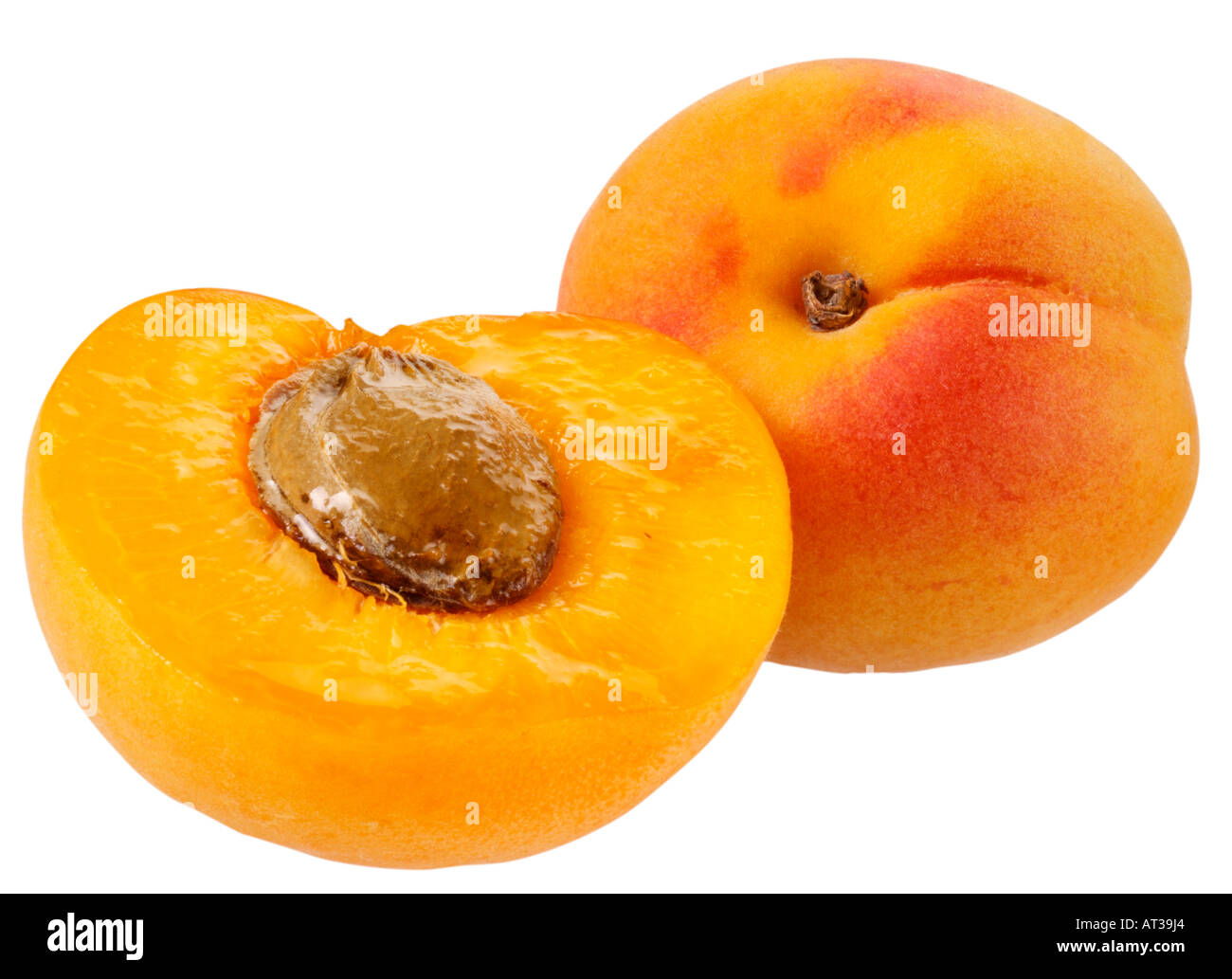 WHOLE AND HALF APRICOT CUT OUT Stock Photo - Alamy