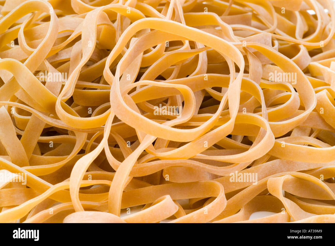 Natural coloured elastic bands Stock Photo - Alamy