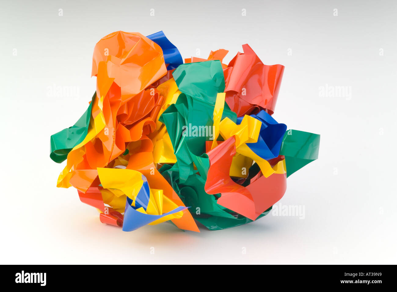 Off-cuts colourful plastic vinyl waste rolled into a ball Stock Photo ...