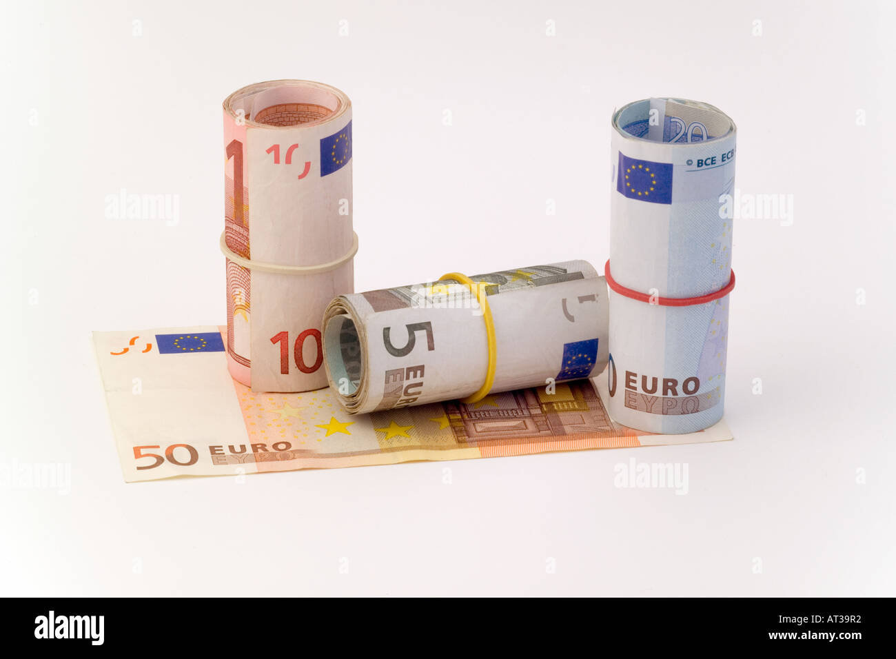 Rolls of Euro bank notes in a pile Stock Photo - Alamy