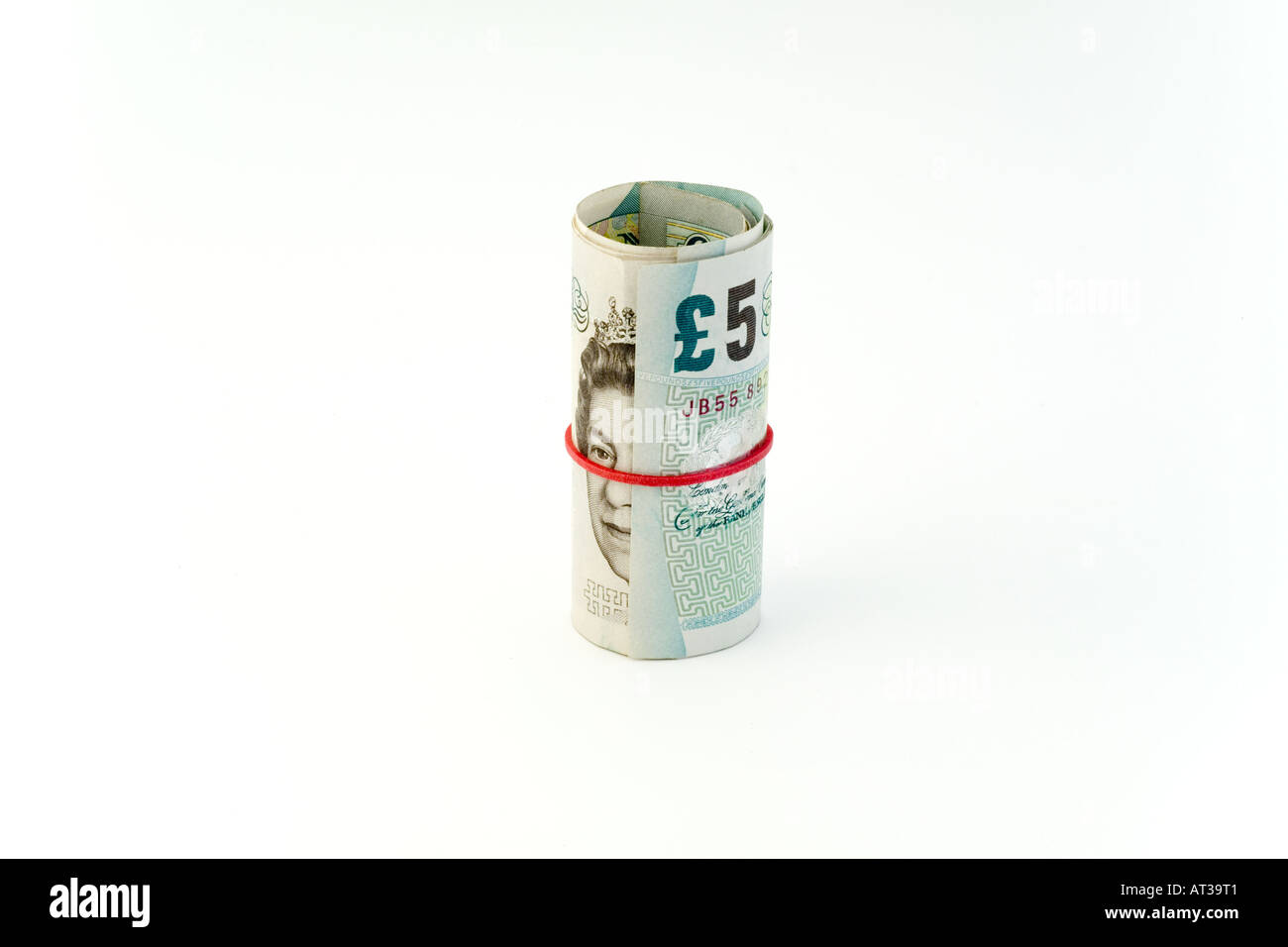 Roll of five pound notes UK Stock Photo - Alamy