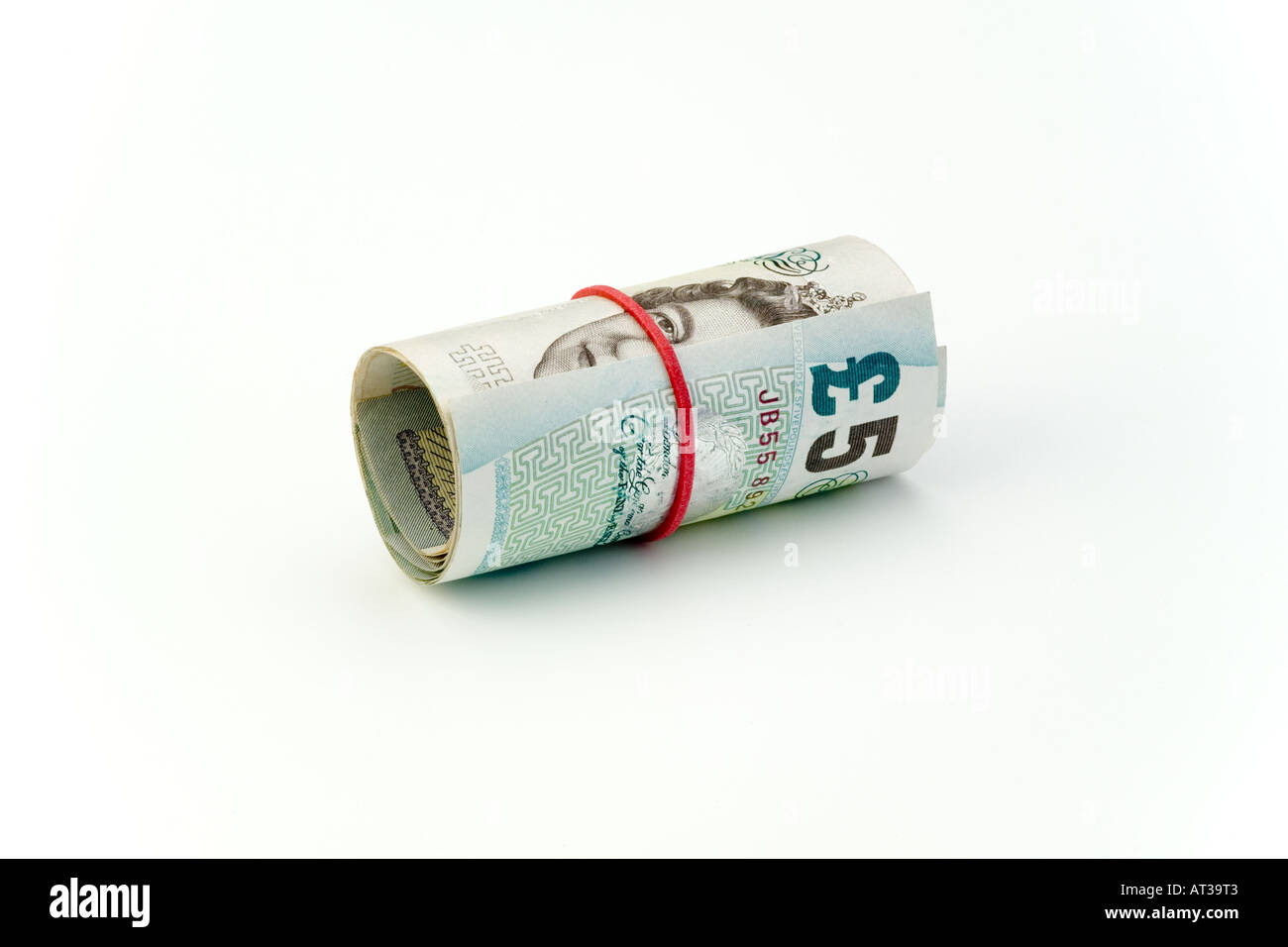 Roll of five pound notes UK Stock Photo - Alamy