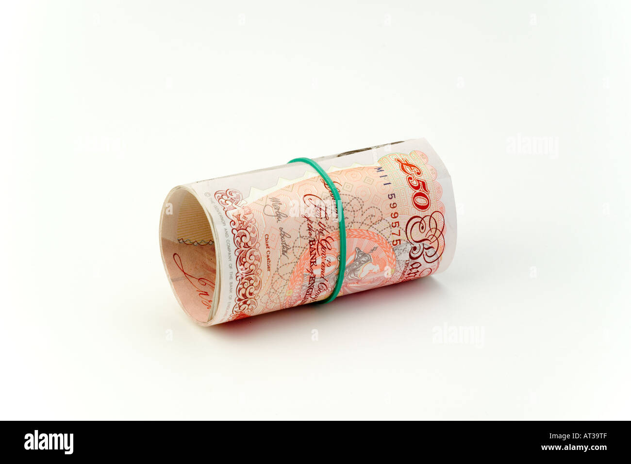 Roll fifty pound notes hi-res stock photography and images - Alamy