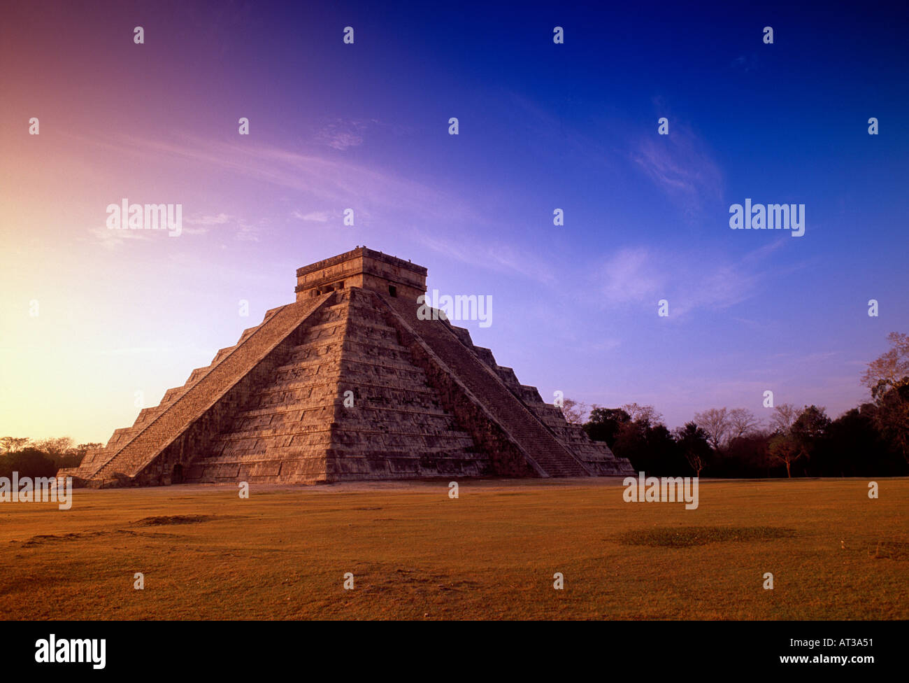 El Castillo pyramid in Chichen Itza Yucatan Mexico is framed by a deep ...