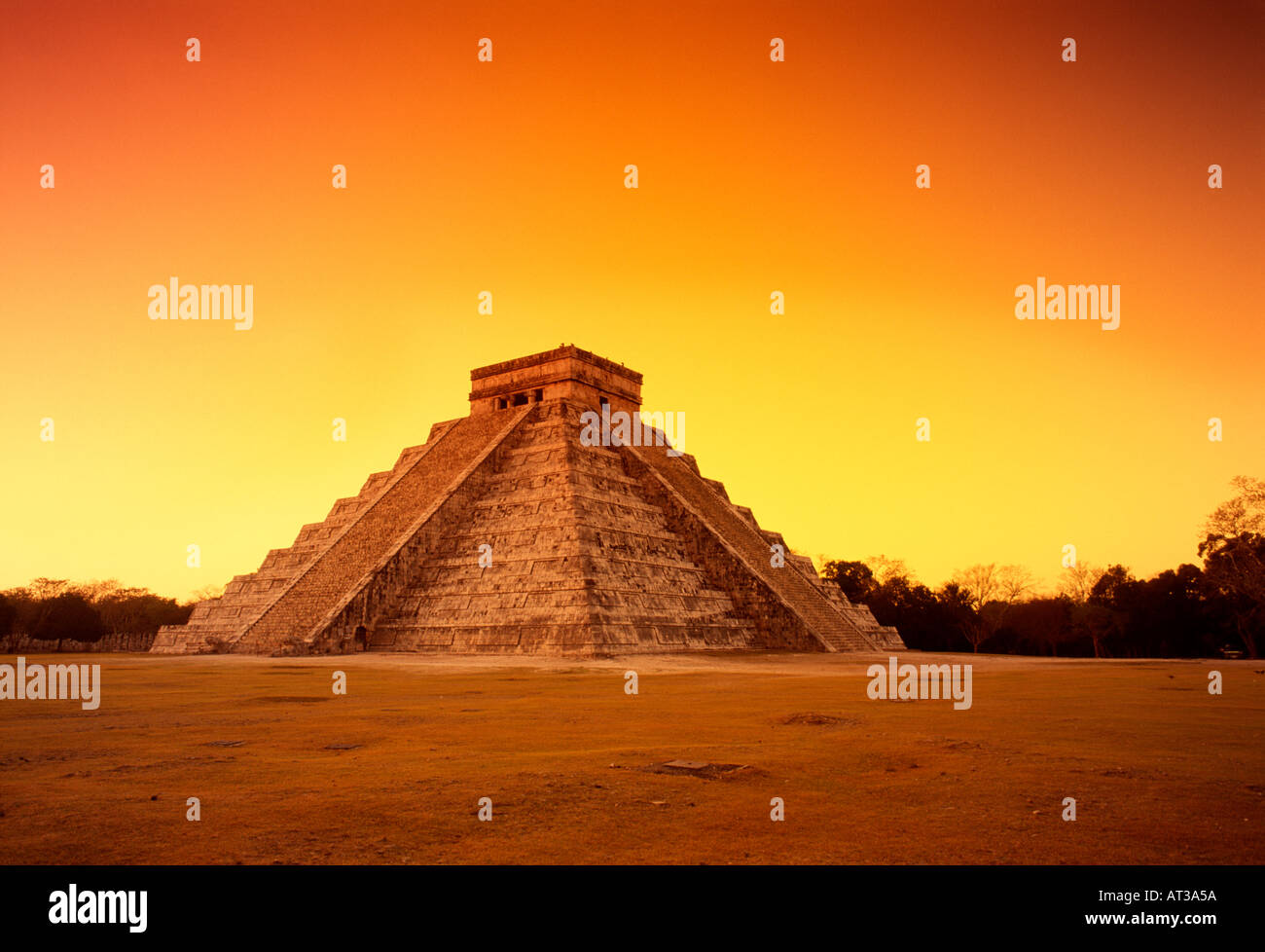 El Castillo pyramid in Chichen Itza Yucatan Mexico is framed by a deep ...
