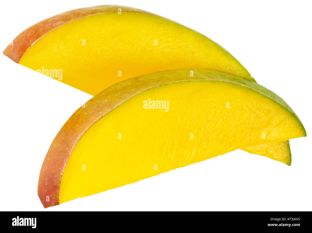 TWO MANGO SEGMENTS CUT OUT Stock Photo - Alamy