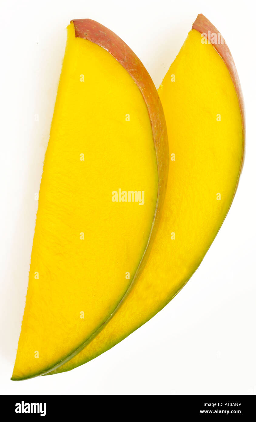 TWO MANGO SEGMENTS CUT OUT Stock Photo - Alamy
