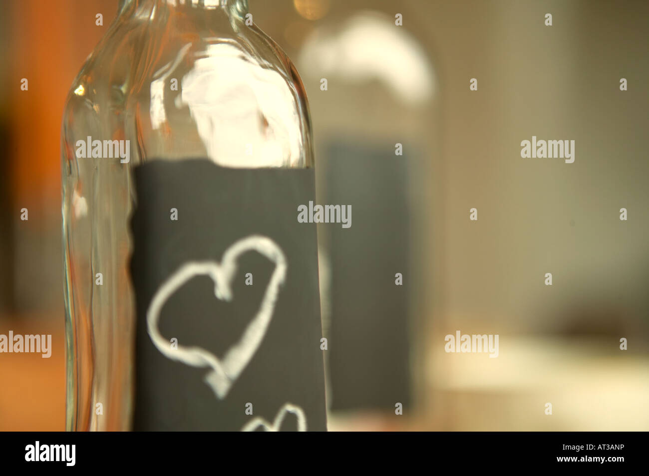 Heart shaped detail on a bottle, close-up Stock Photo - Alamy