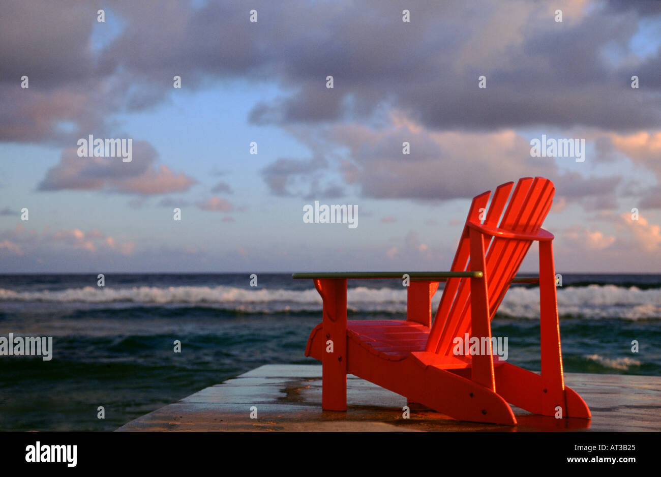 Red Chair On Beach Barbados Stock Photo - Alamy