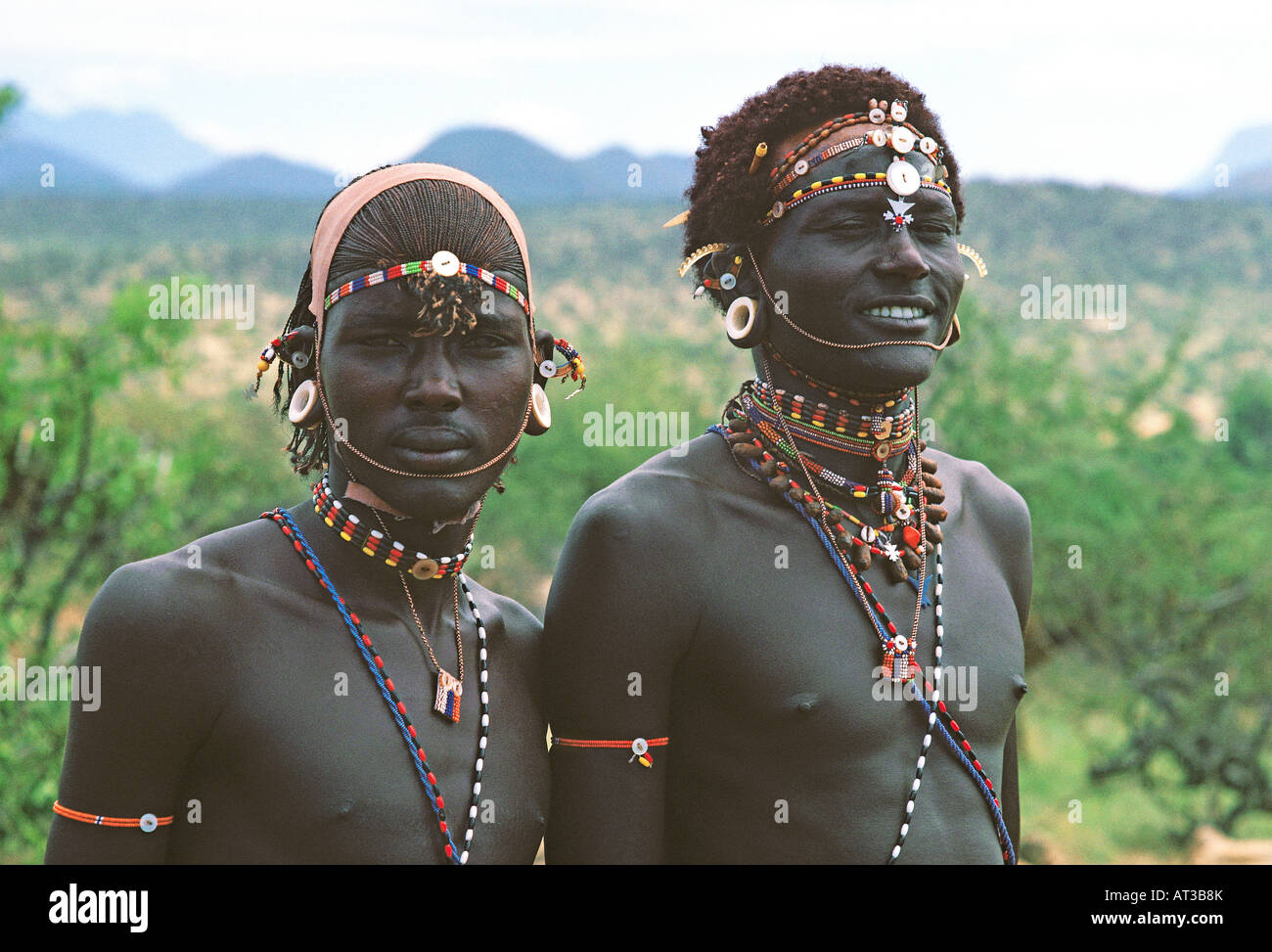 Portrait head and shoulders of two Samburu warriors or moran in ...