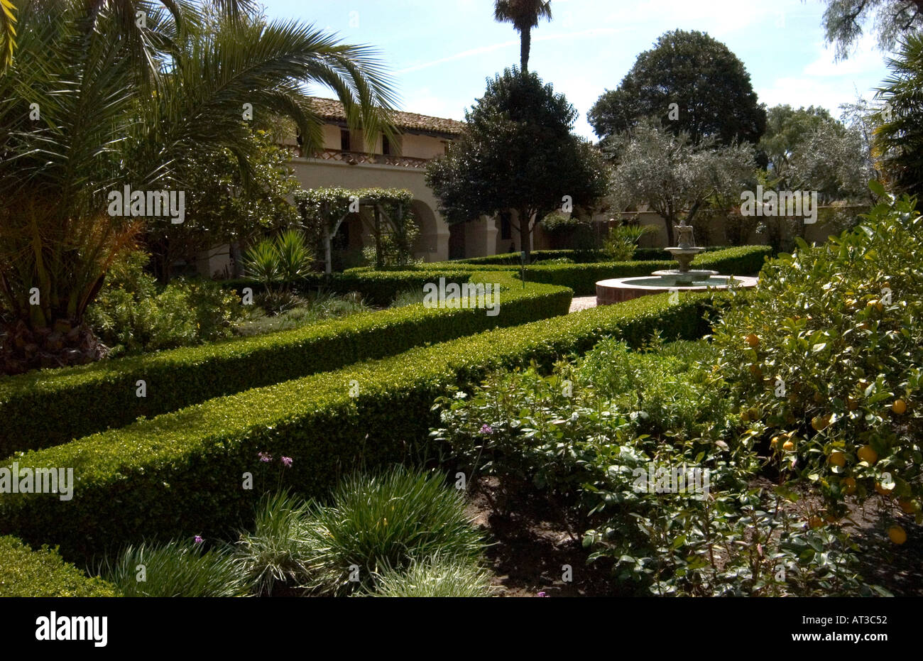 Formal garden at Santa Ines Spanish Mission still operating in Solvang ...