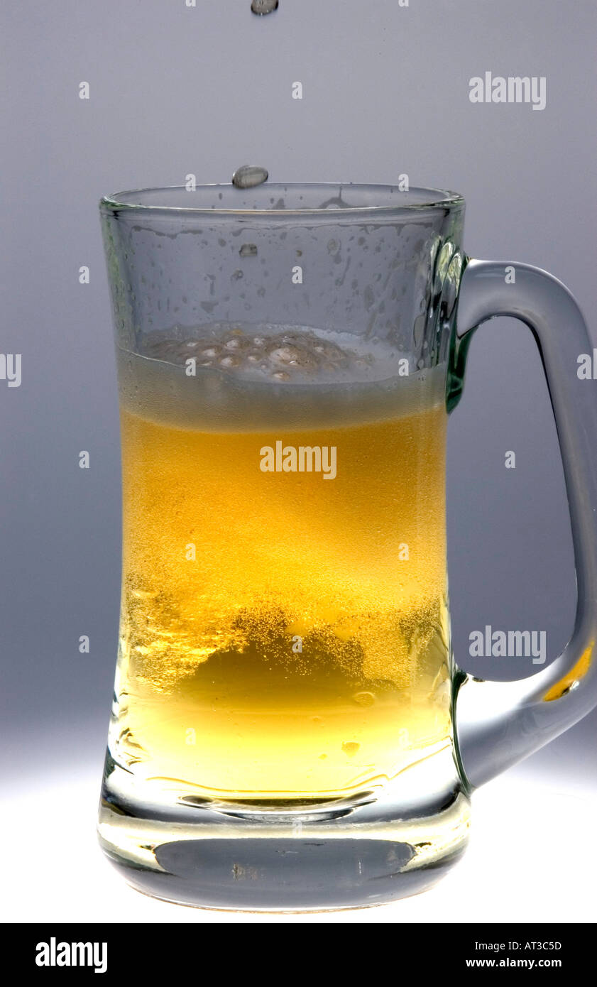 Half filled beer mug hi-res stock photography and images - Alamy