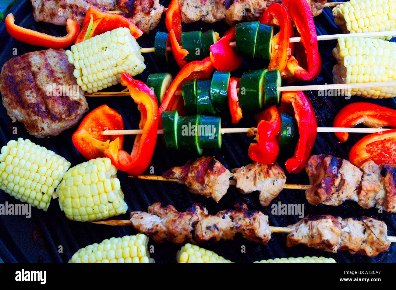 colorful BBQ food on grill Stock Photo - Alamy
