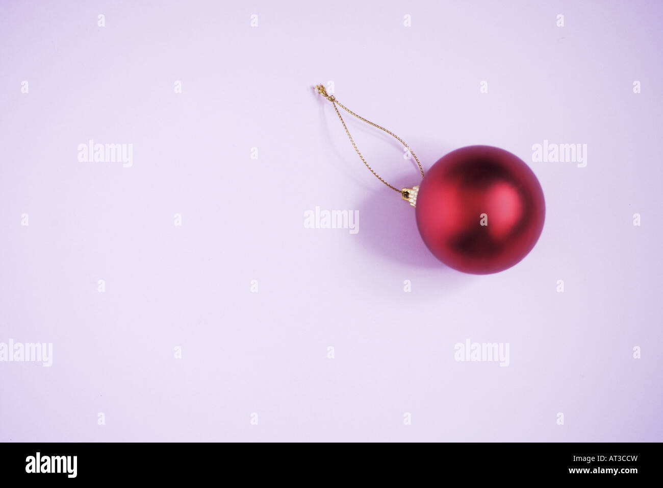 A single red bauble Stock Photo - Alamy