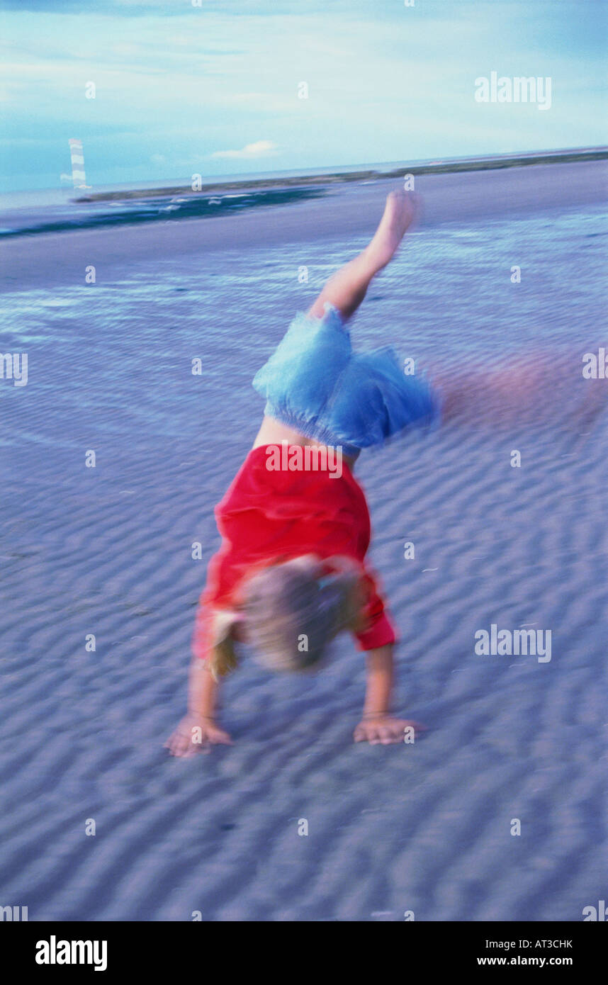 Girl Doing A Cartwheel High Resolution Stock Photography and Images - Alamy