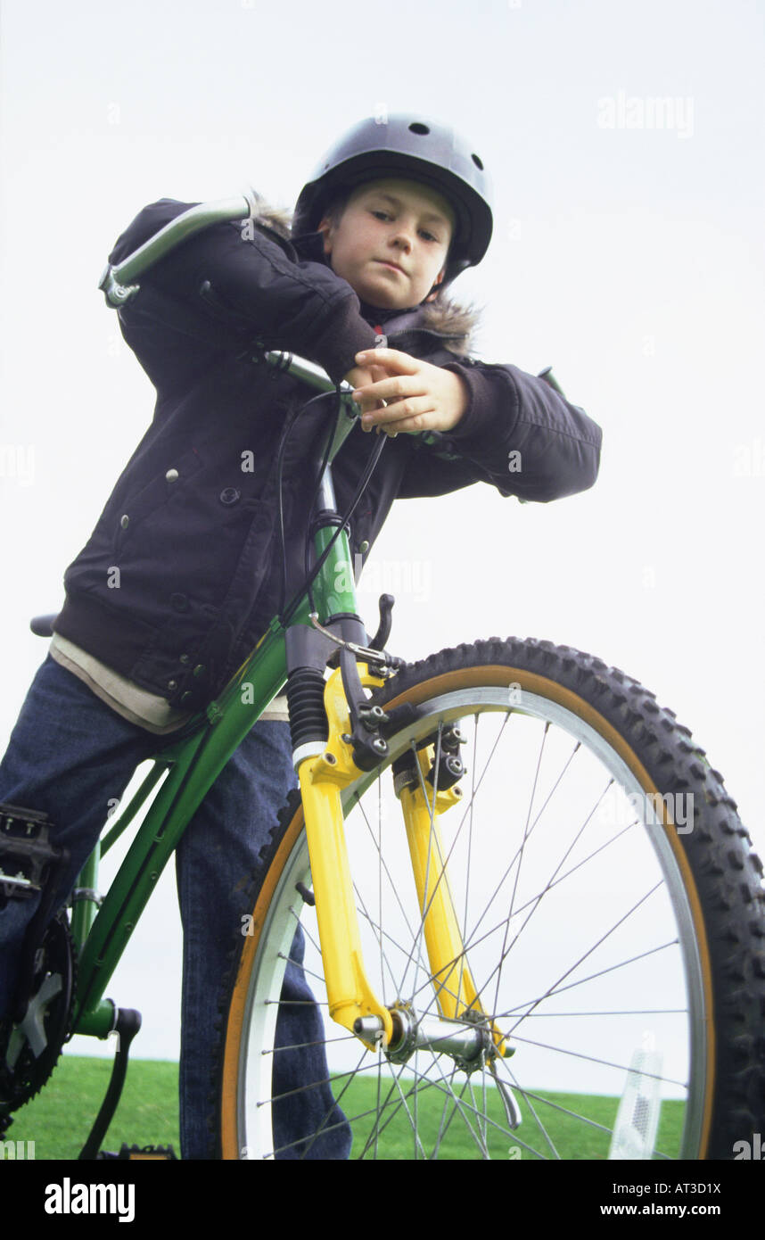 A boy on a bicycle, close-up Stock Photo - Alamy